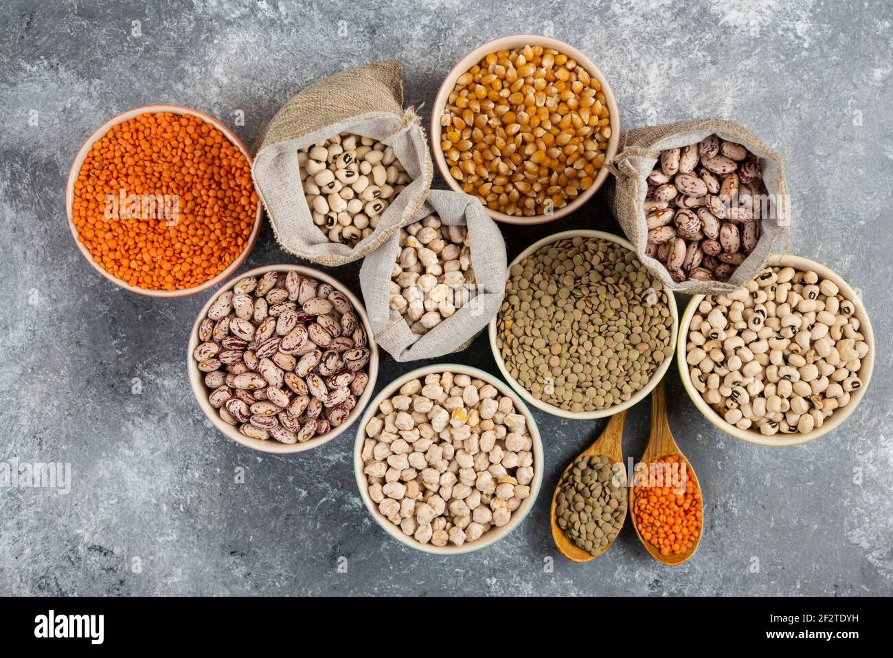 Different type of raw dry legumes composition on marble surface Stock ...
