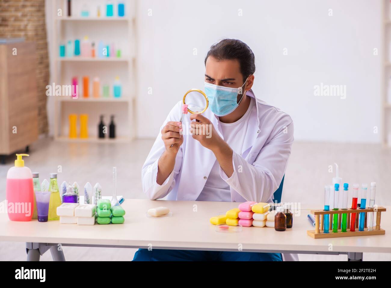 Young chemist testing soap in the lab Stock Photo - Alamy