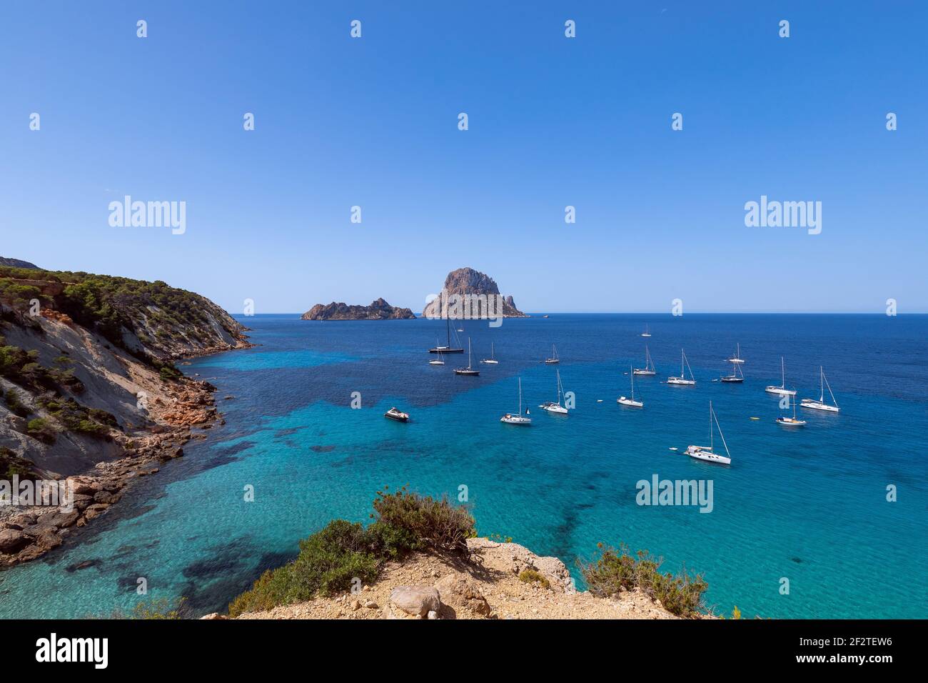 Beautiful panoramic view of the mountain Es Vedra and sea sailing ...