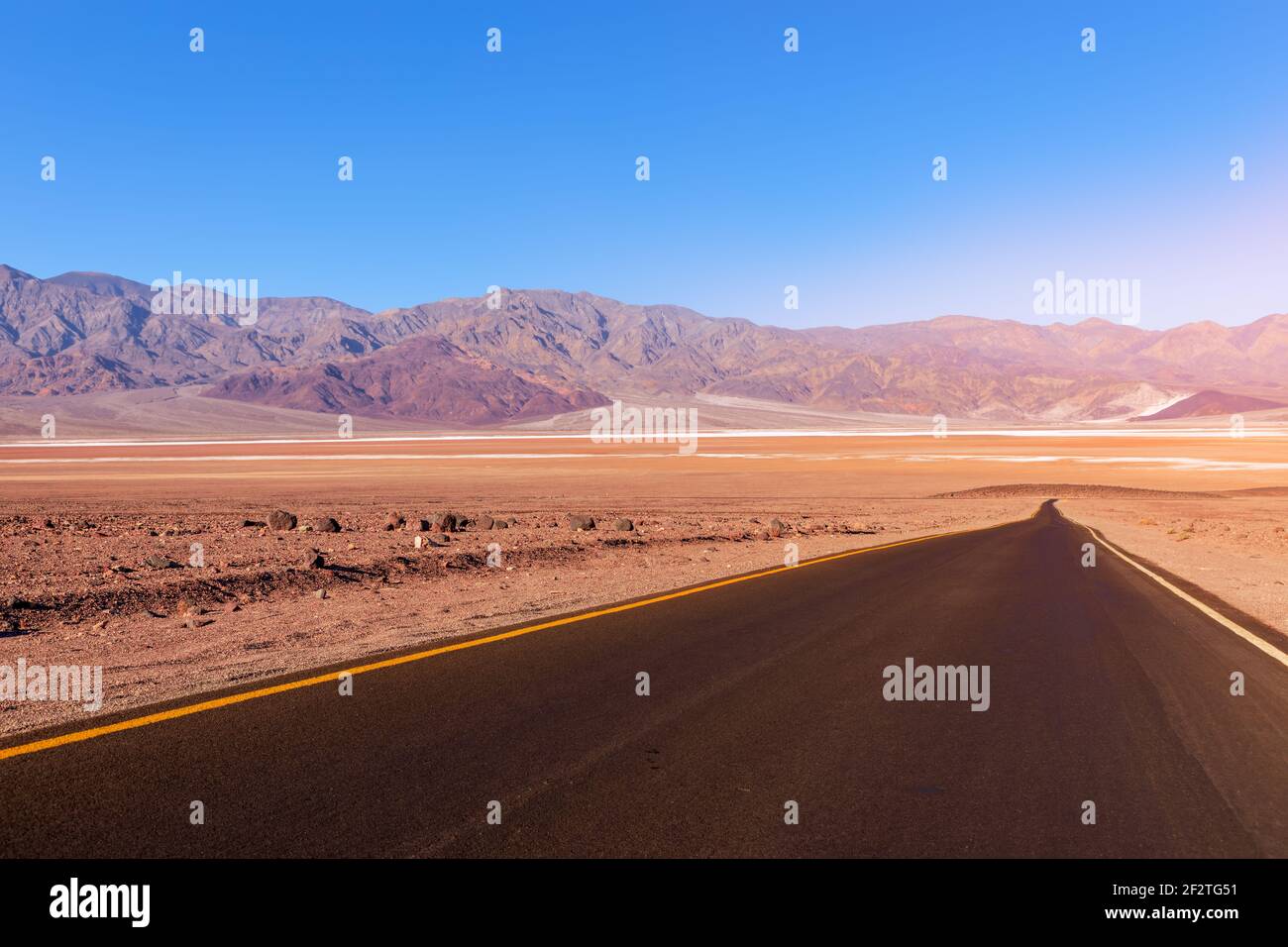 View of highway (Artists Dr.) crossing Death Valley National Park ...
