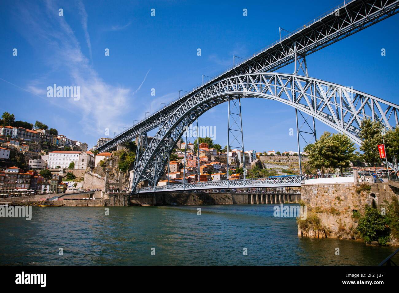 The Dom Luis bridge, crossing the Douro river in the historical city of ...