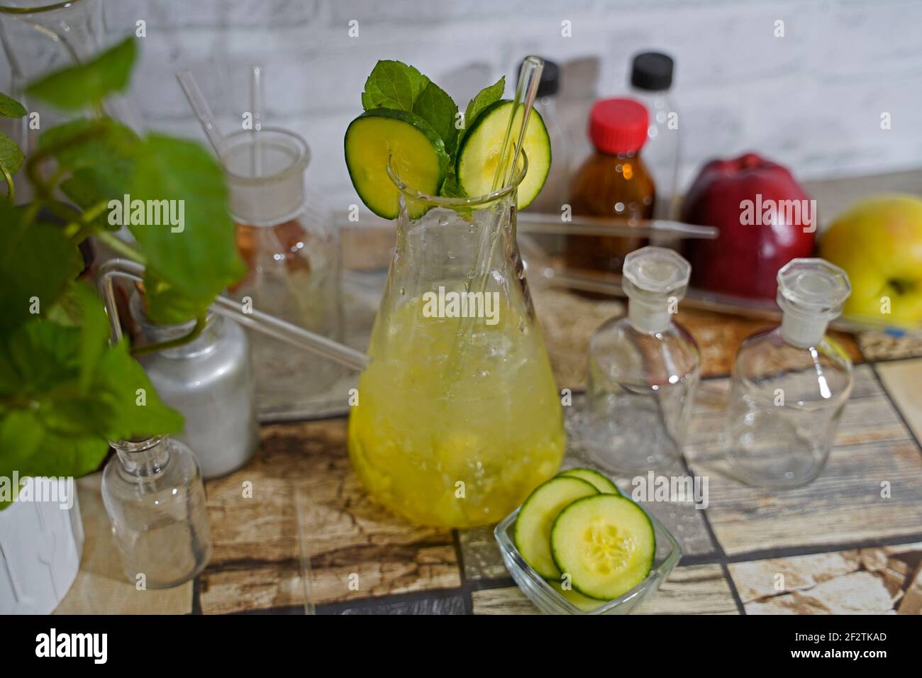 cucumber Laboratory cocktail in flask. tasty cocktails made and served ...