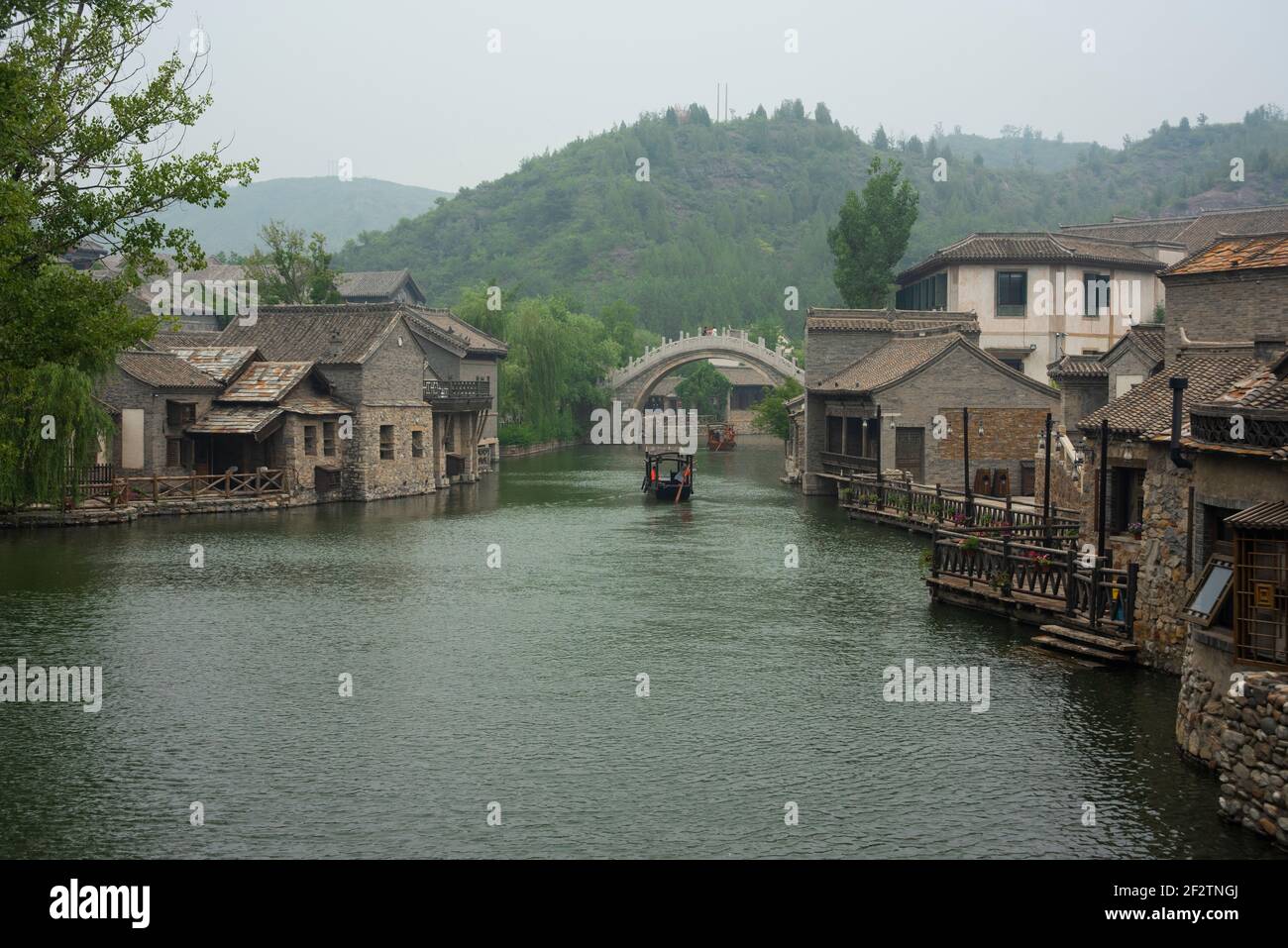 Medieval european town in the bank of a river Stock Photo - Alamy
