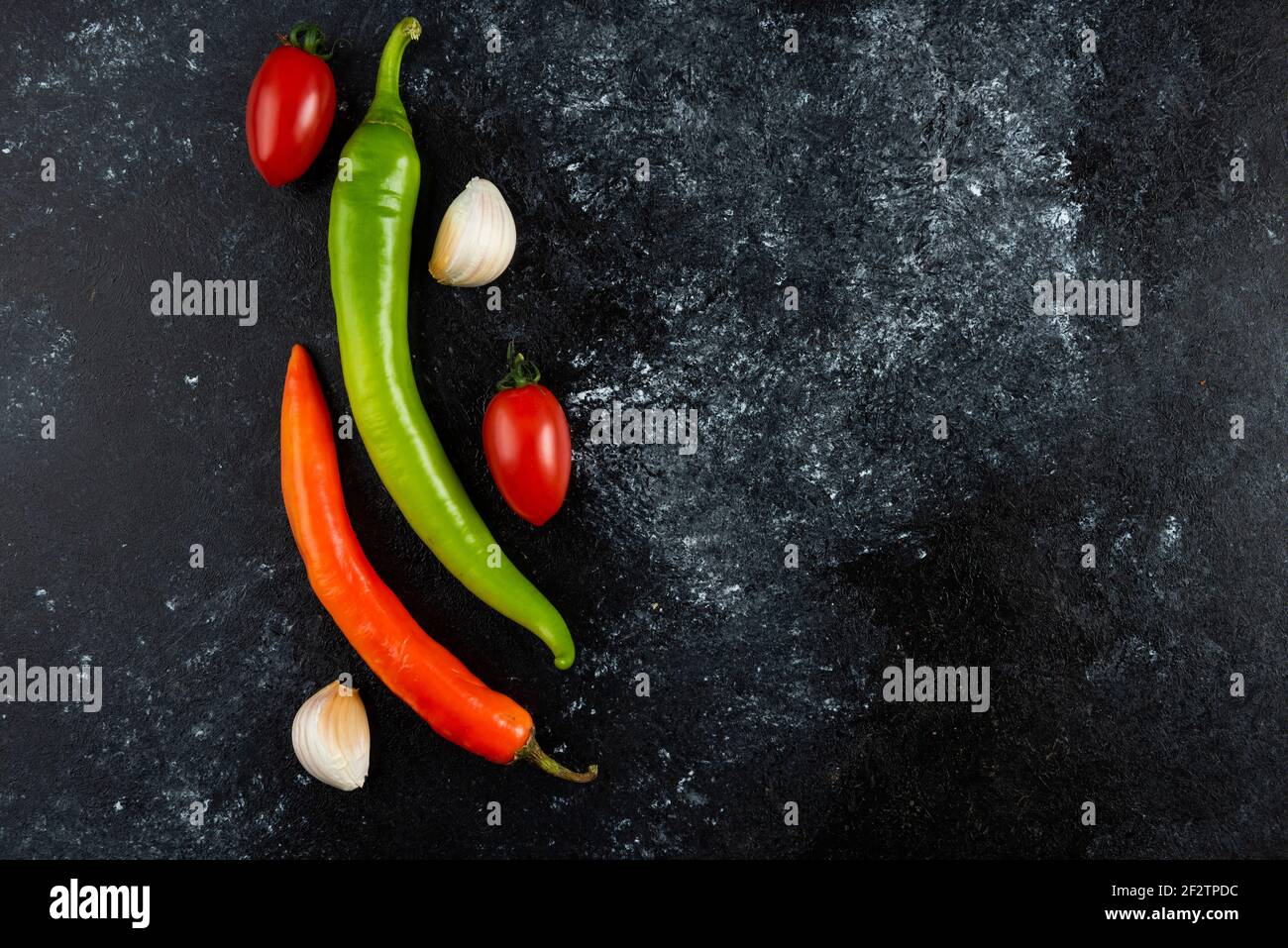 Garlic chili peppers tomatoes hi-res stock photography and images - Alamy