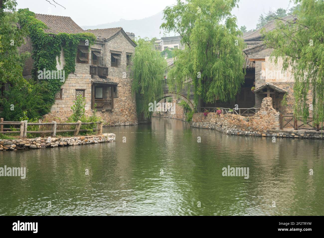 Medieval european town in the bank of a river Stock Photo - Alamy