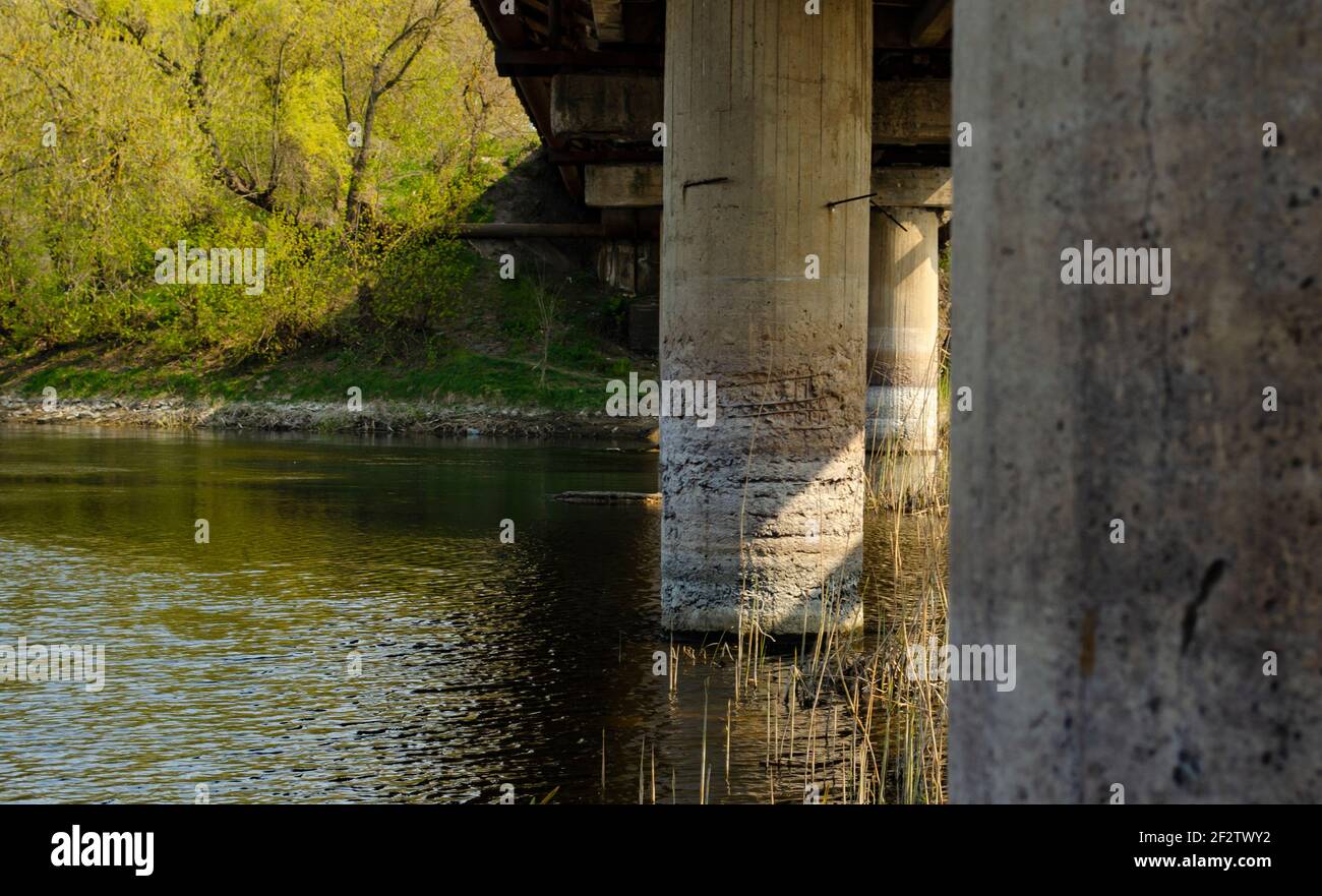 Destruction of the reinforced concrete column of the bridge. Bridge ...