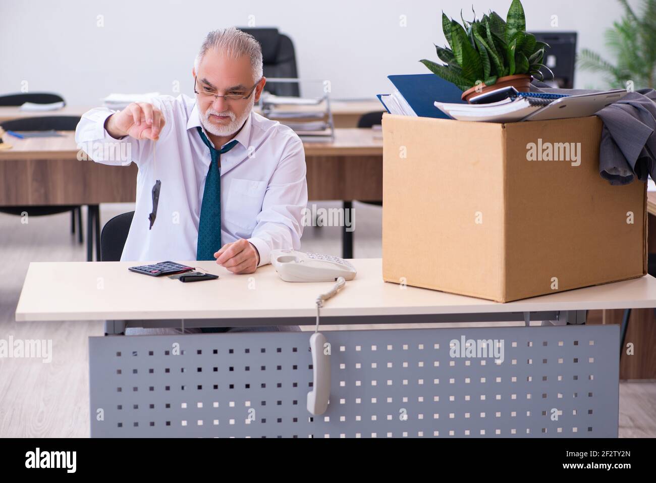 Old employee being fired from his work Stock Photo - Alamy