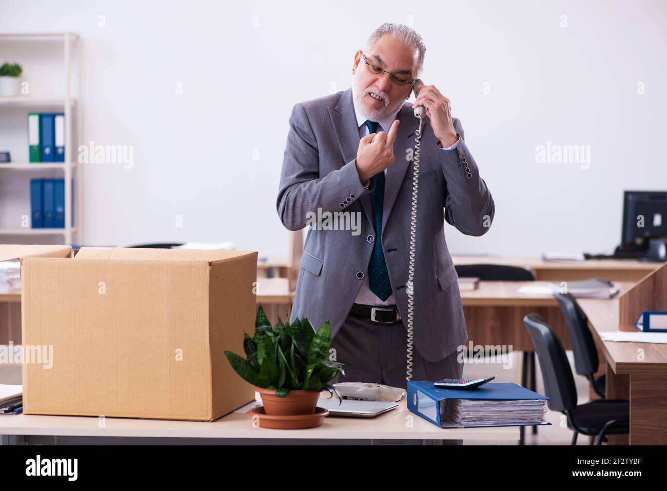 Old employee being fired from his work Stock Photo - Alamy