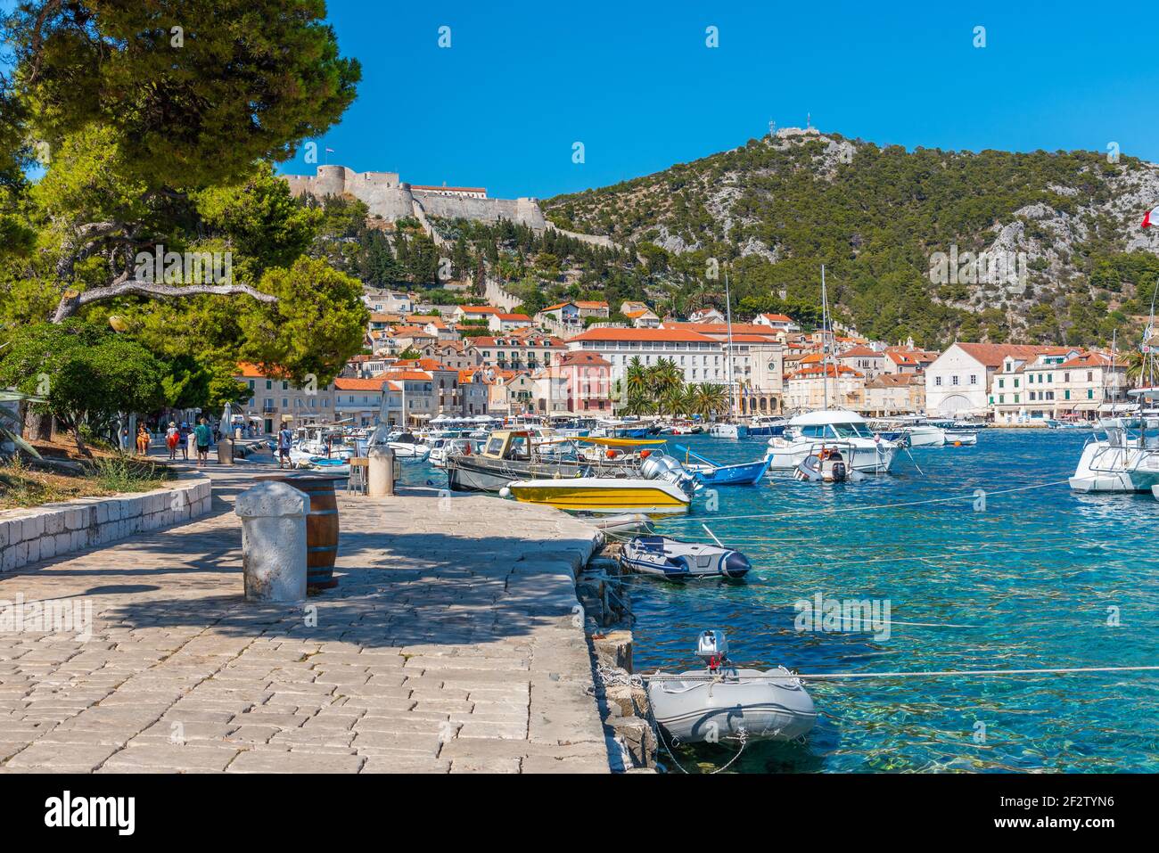 People are strolling at waterfront of Hvar town in Croatia Stock Photo ...