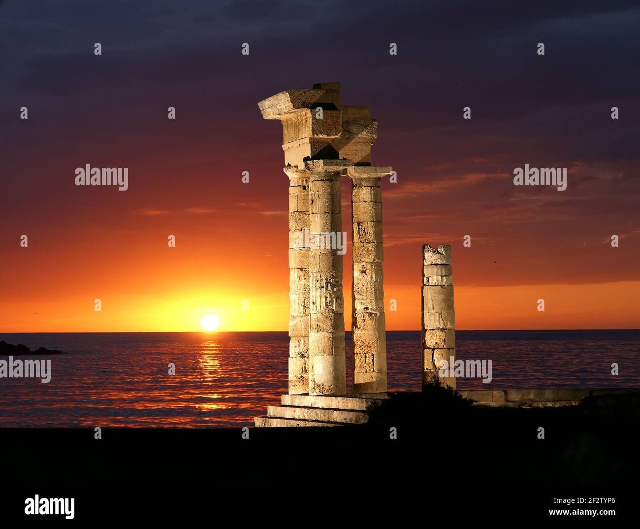 Apollo Temple at the Acropolis of Rhodes at night, Greece Stock Photo ...