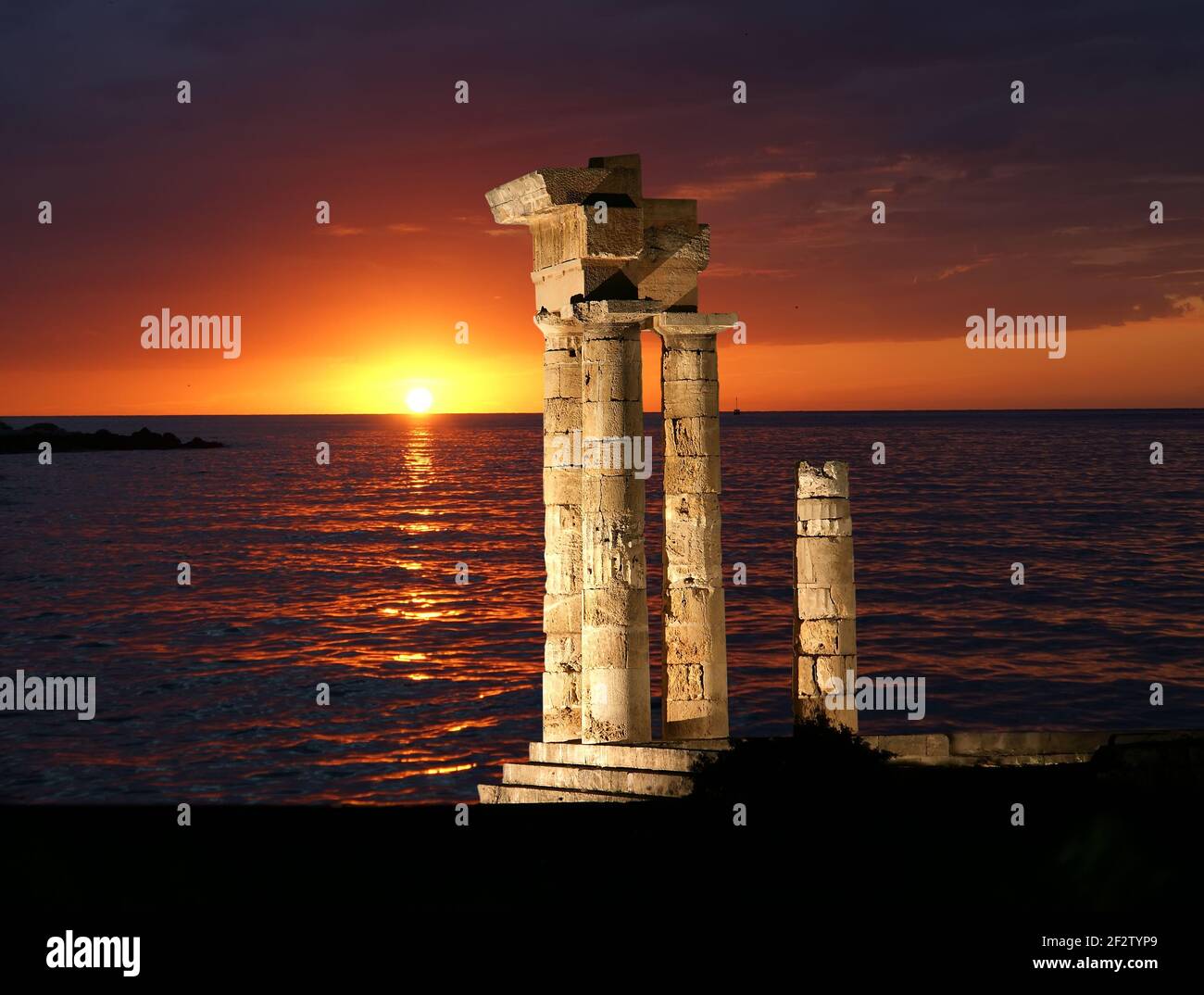 Apollo Temple at the Acropolis of Rhodes at night, Greece Stock Photo ...