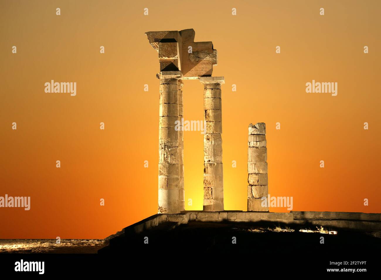 Apollo Temple at the Acropolis of Rhodes at night, Greece Stock Photo ...