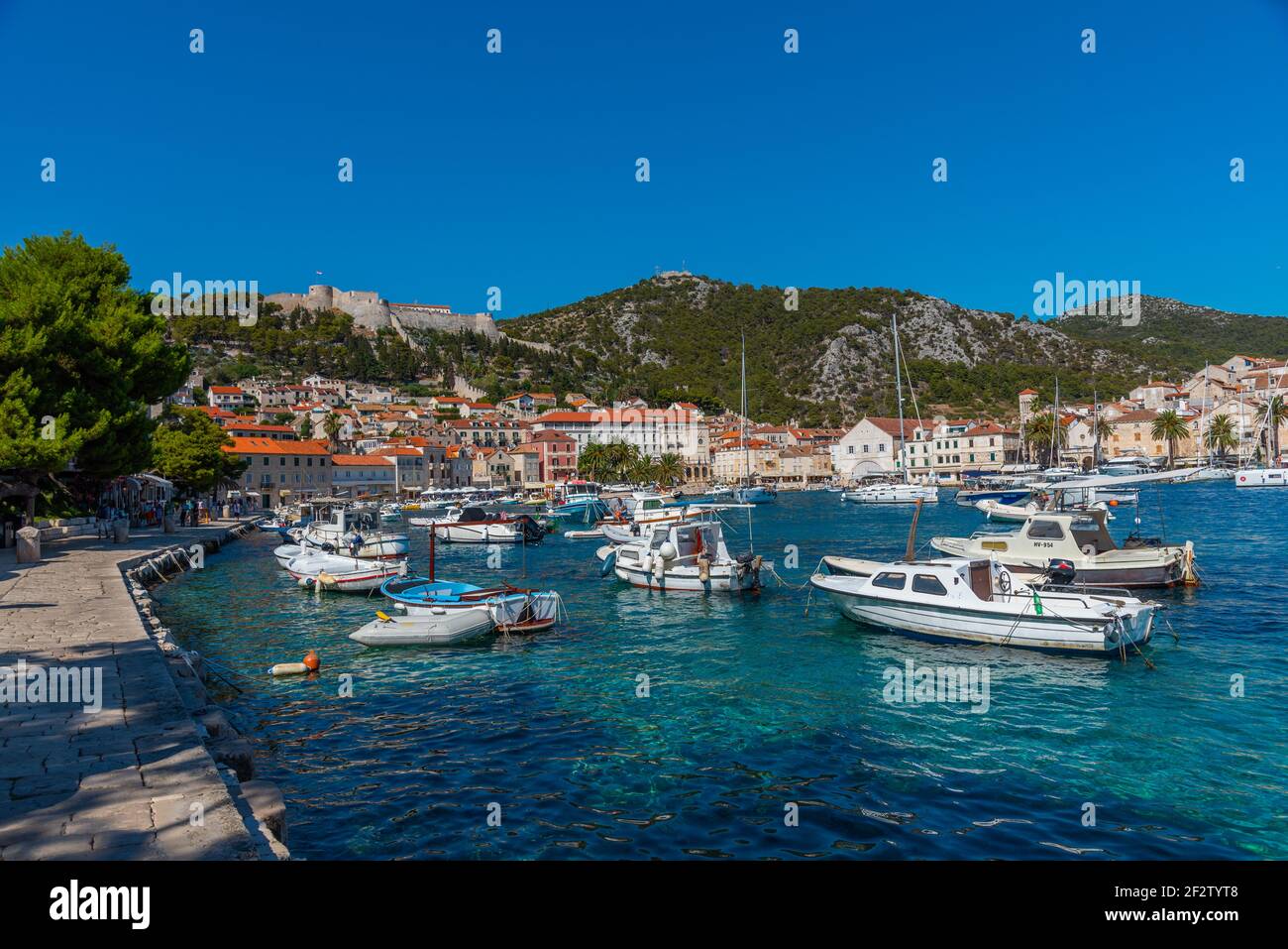 People are strolling at waterfront of Hvar town in Croatia Stock Photo ...