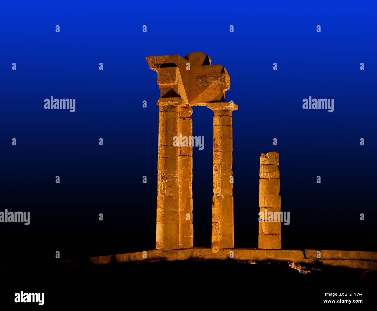 Apollo Temple at the Acropolis of Rhodes at night, Greece Stock Photo ...