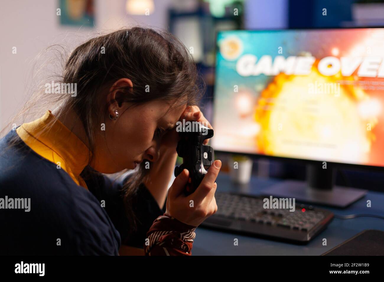 Professional gamer keeping controller hi-res stock photography and ...