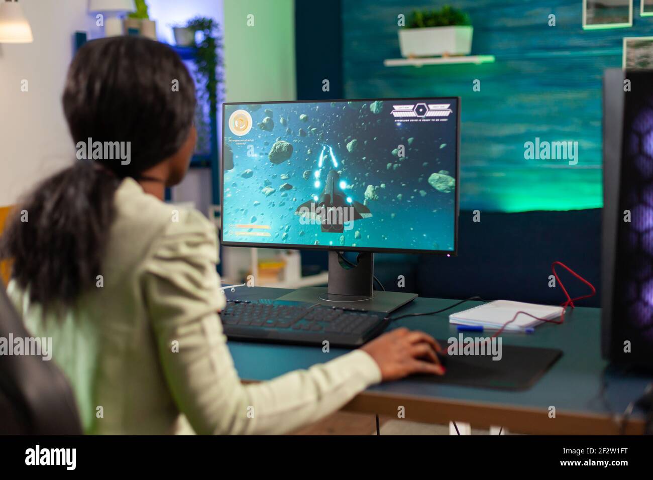 Black professional e sport gamer trying to win competition sitting on ...