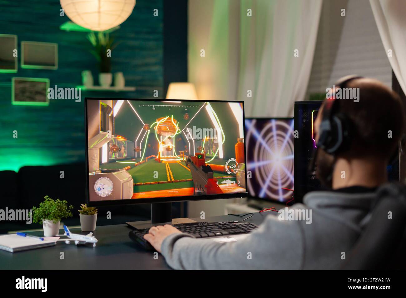 Back view shot professional gamer hi-res stock photography and images ...