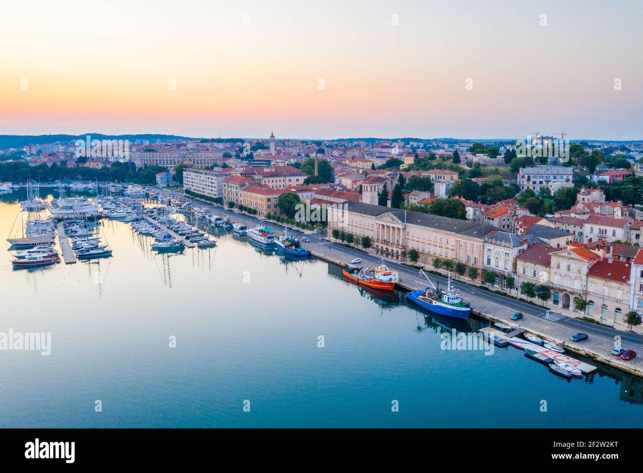 Boats mooring at port of Pula, Croatia Stock Photo - Alamy