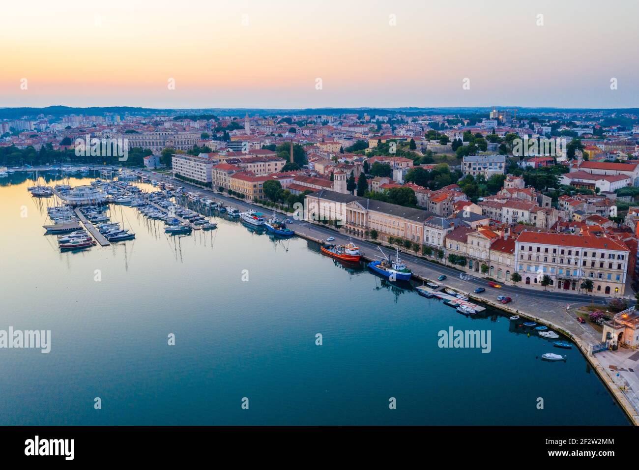Boats mooring at port of Pula, Croatia Stock Photo - Alamy