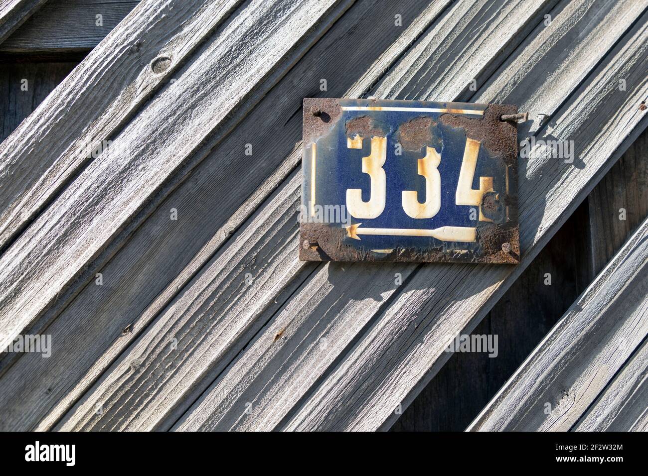 Number 334 number of houses apartments streets. The white number of the ...