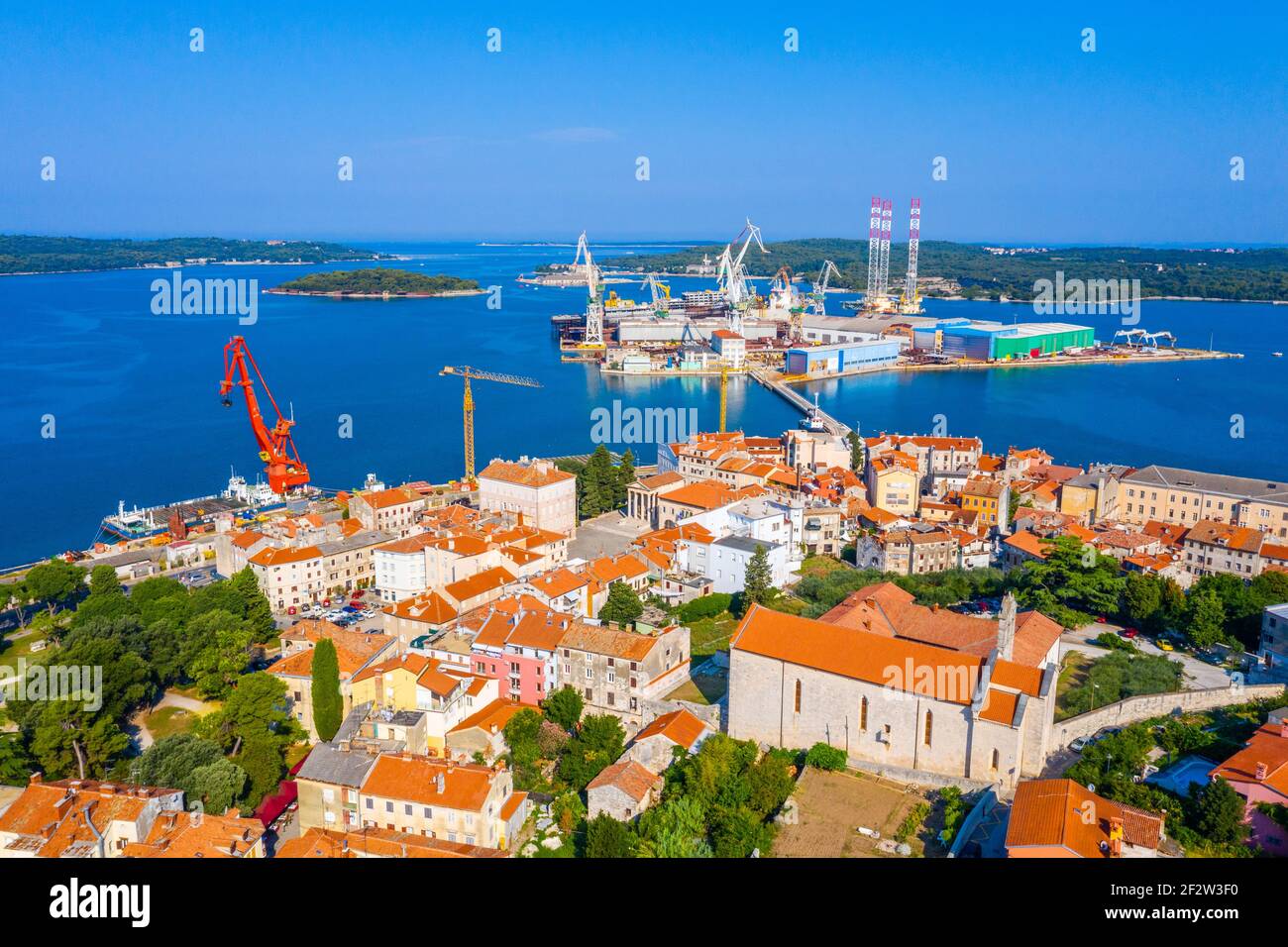 Cityscape of industrial port in Pula, Croatia Stock Photo - Alamy