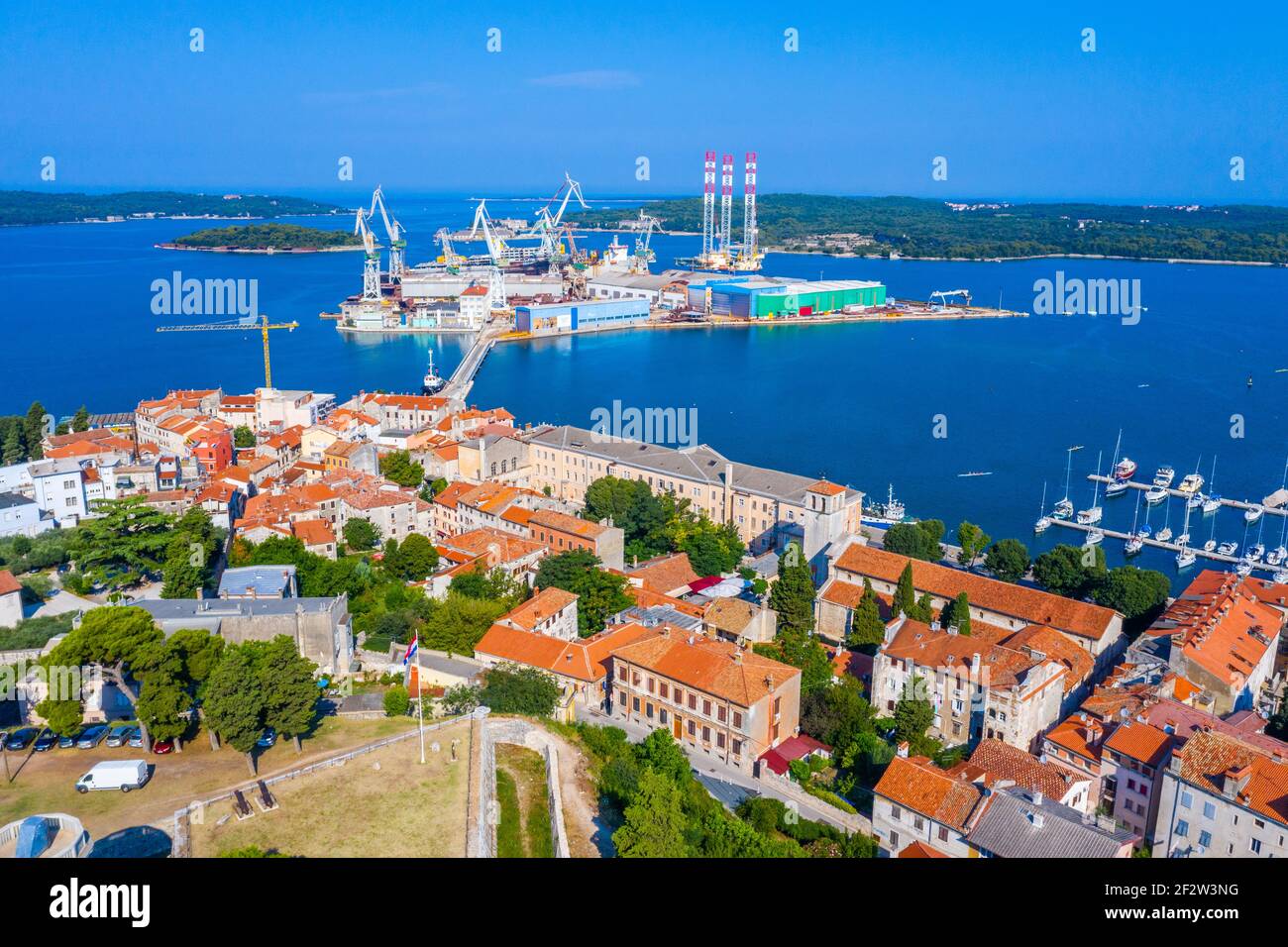 Cityscape of industrial port in Pula, Croatia Stock Photo - Alamy