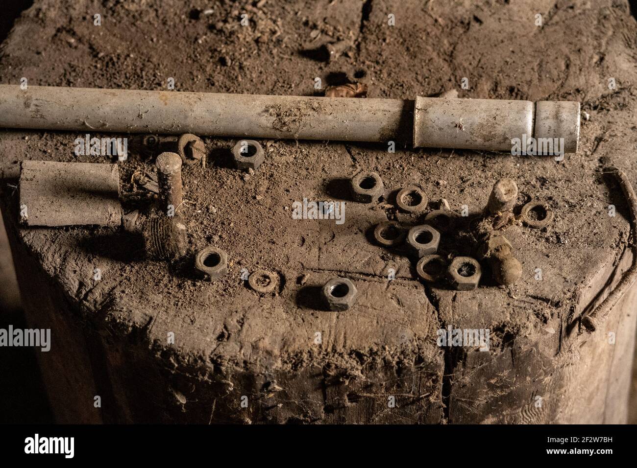 scrap metal parts and old rusty tools in abandoned workshop ancient ...