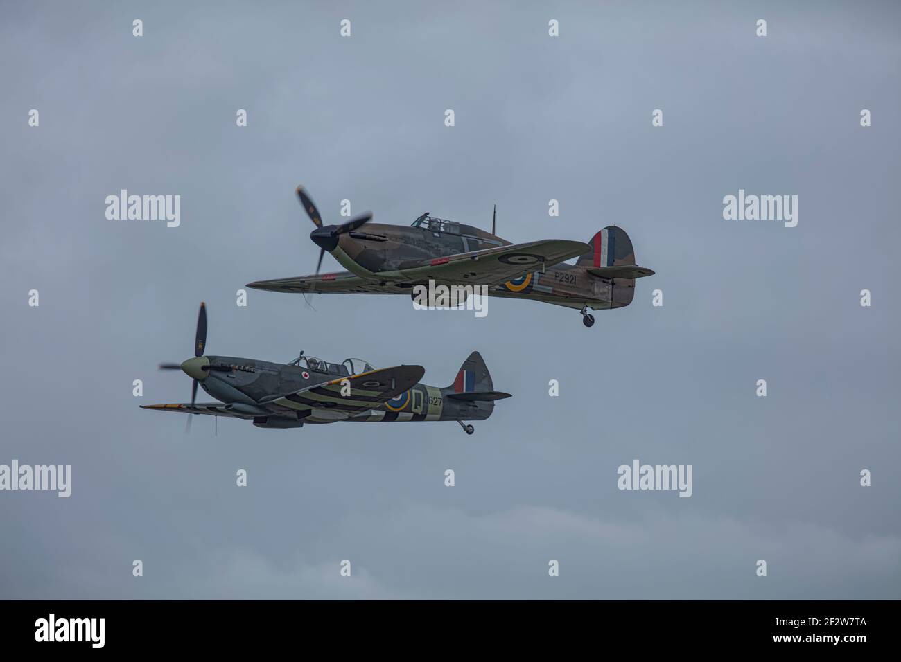 BBMF RAF Hurricane and Spitfire in flight in the sky Stock Photo - Alamy