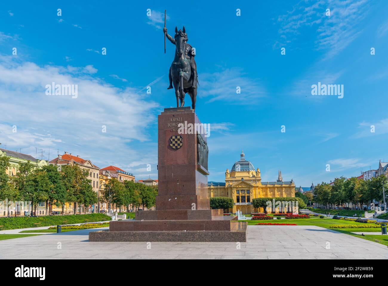 Statue of King Tomislav and yellow art pavilion in Zagreb, Croatia ...