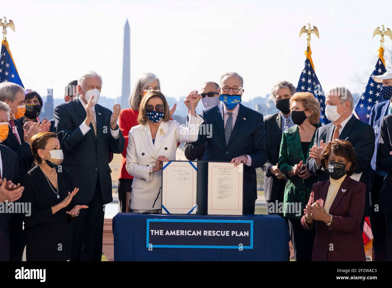 Nancy pelosi signing bill 2021 hi-res stock photography and images - Alamy