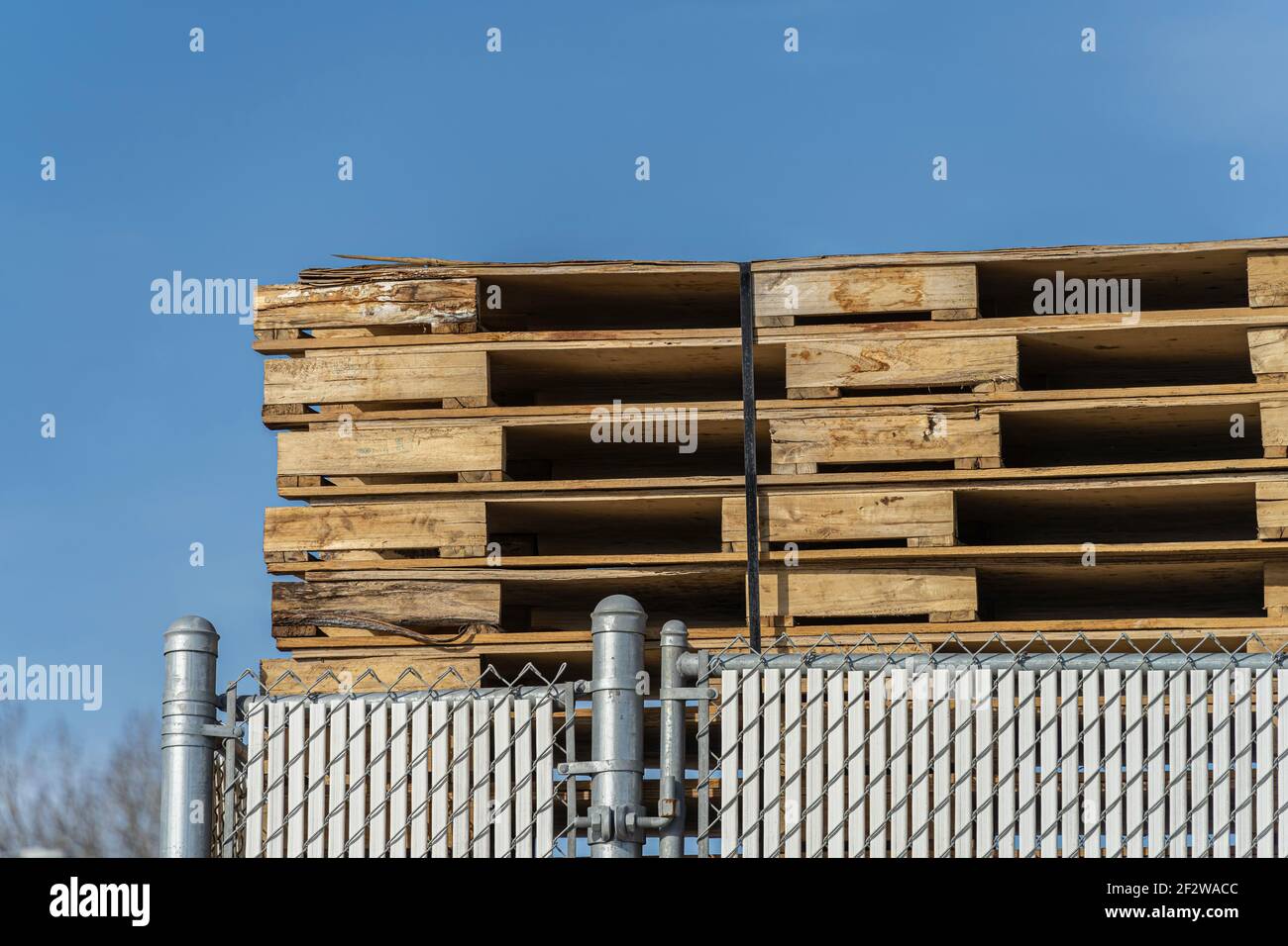 Stack of wood pallets ready for delivery to customer Stock Photo - Alamy