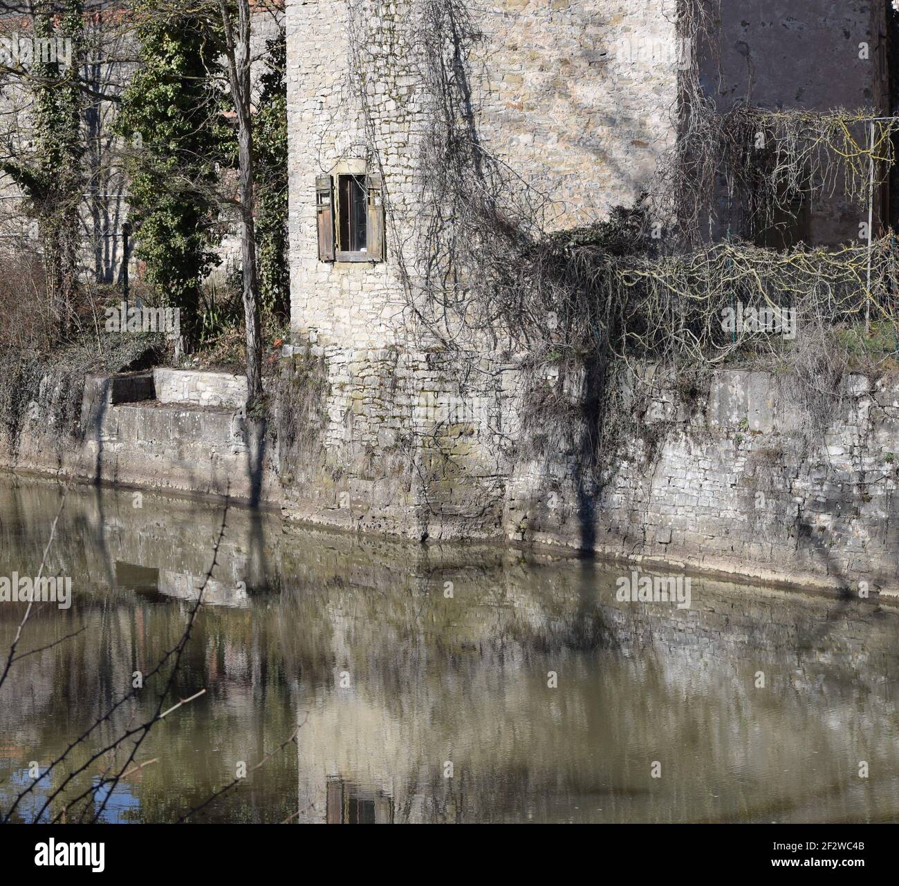ancient abandoned Harbor basin with Quay wall Stock Photo - Alamy