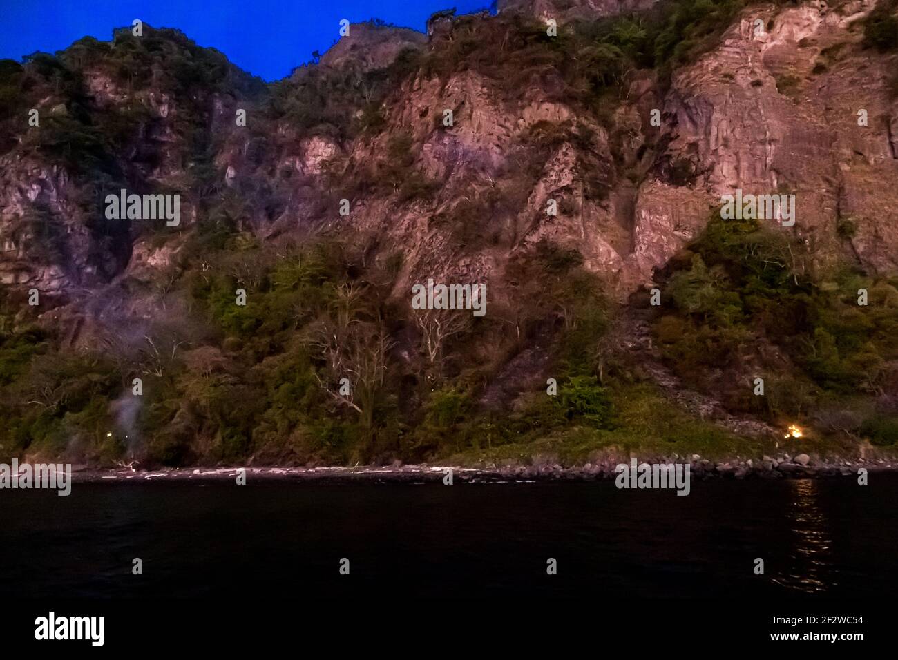 The Batu Tara volcano on the indonesian island of Komba regularly emits ...