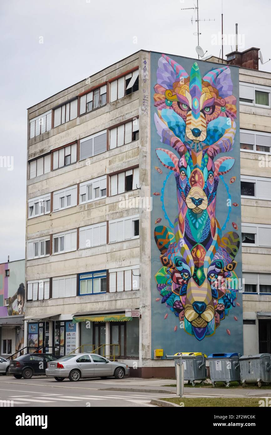 A mural animal called Totem, on a residential building designed by ...