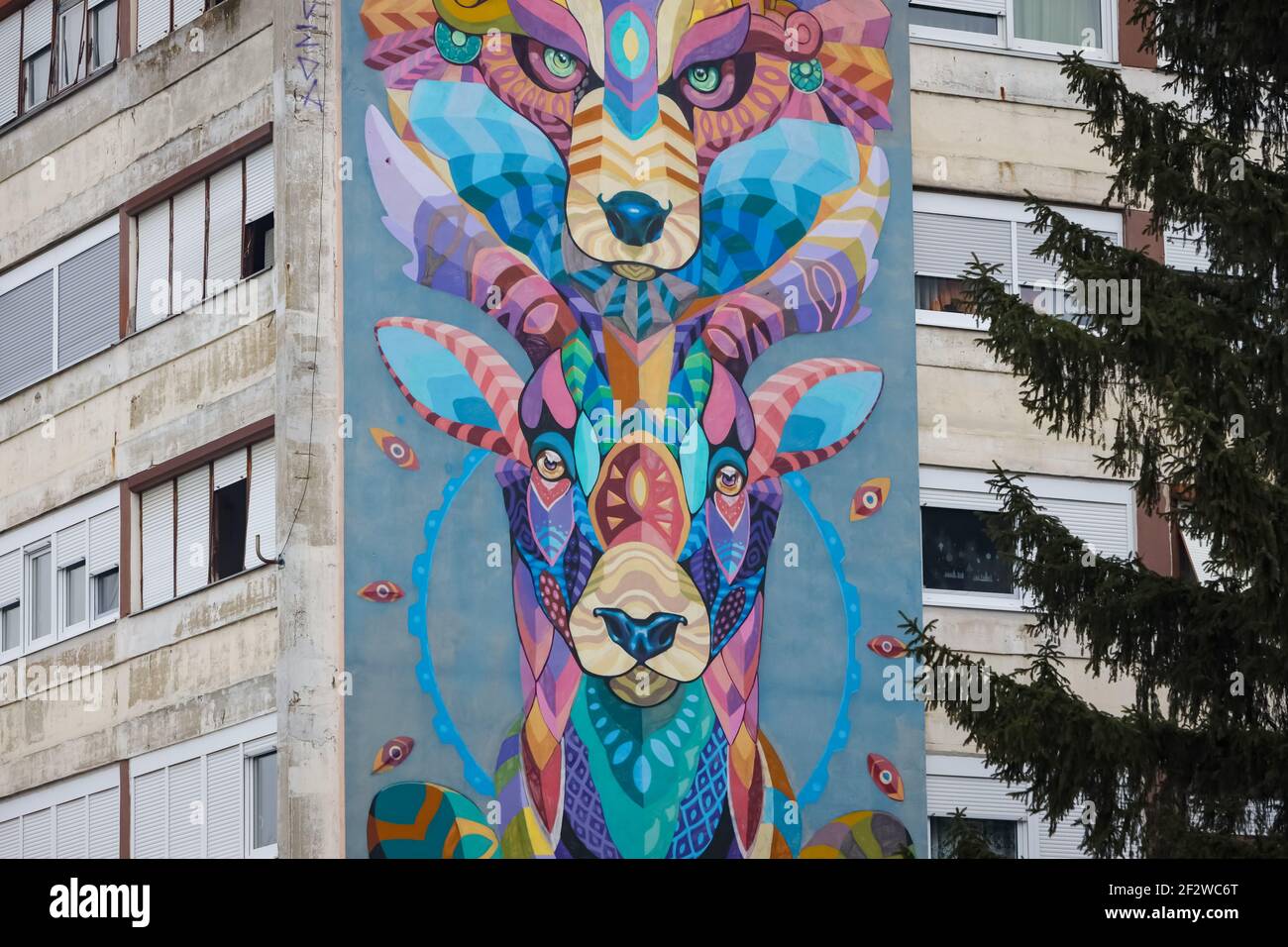 A mural animal called Totem, on a residential building designed by ...