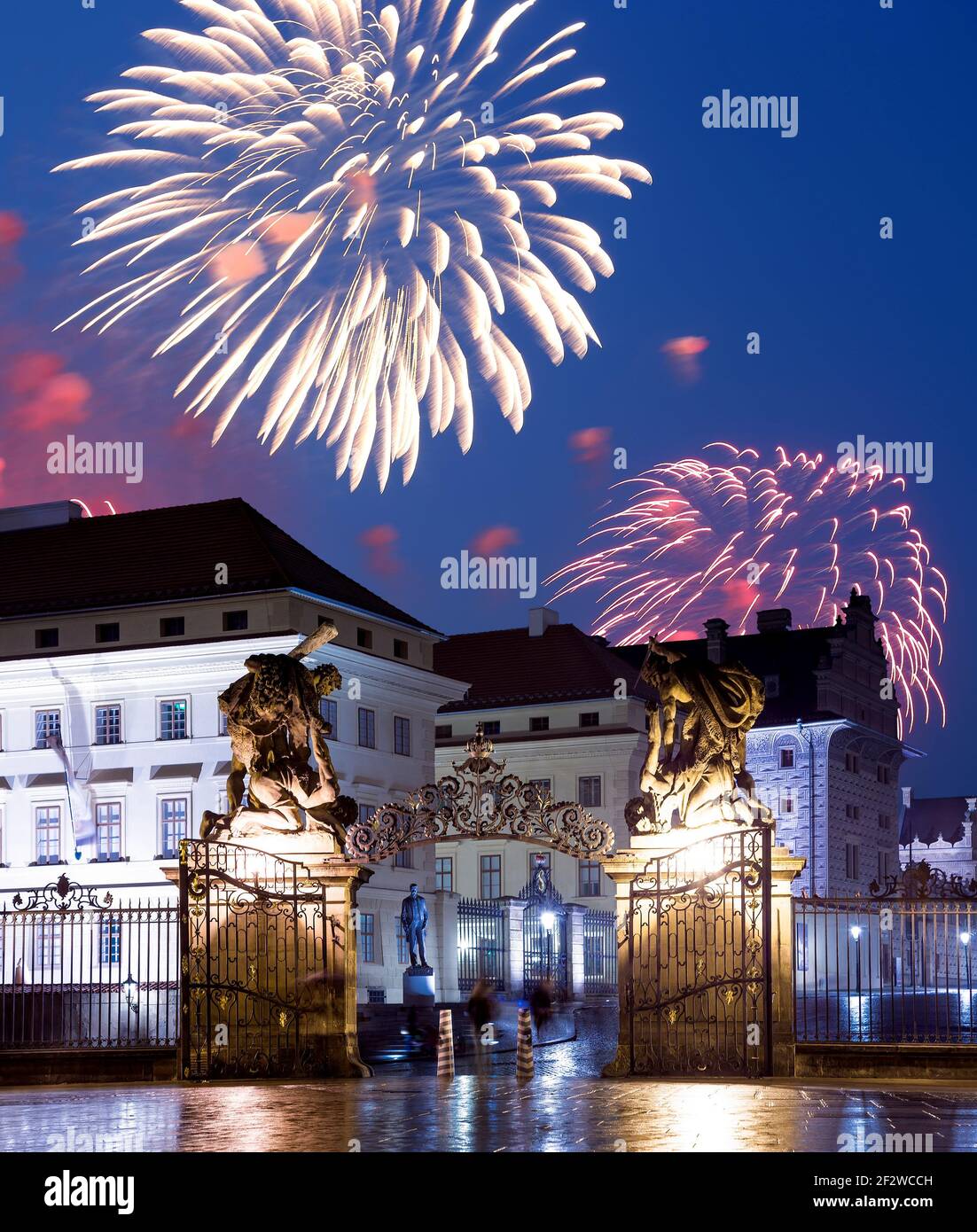 Matthias Gate, at Hradcany Castle Prague at night and holiday fireworks ...