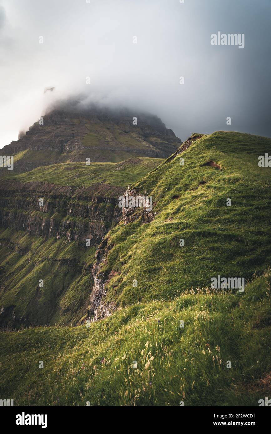 Faroe islands with stormy view towards mykines on the island of Vagar ...