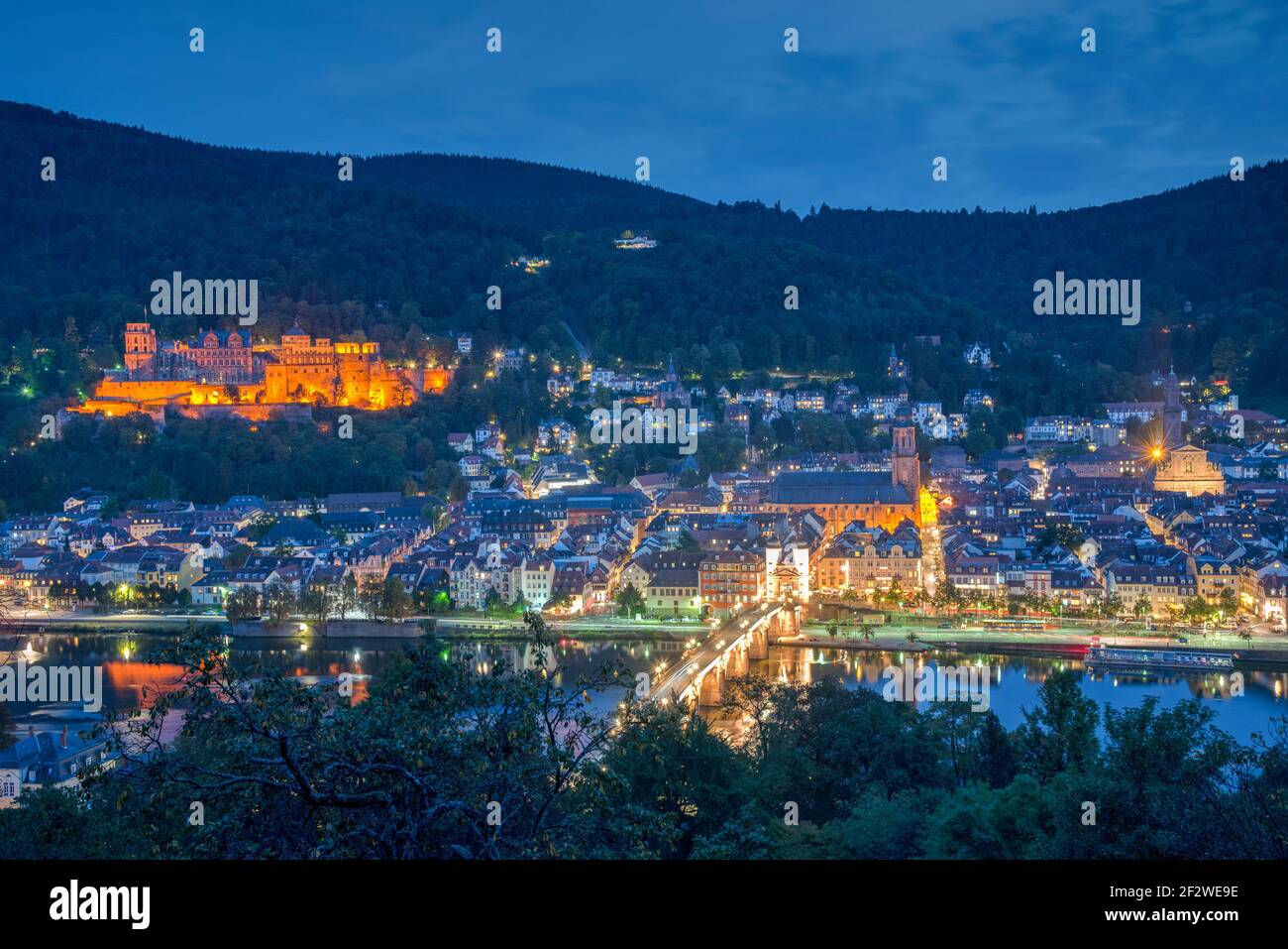 Sunset view of Heidelberg behind Neckar river, Germany Stock Photo - Alamy
