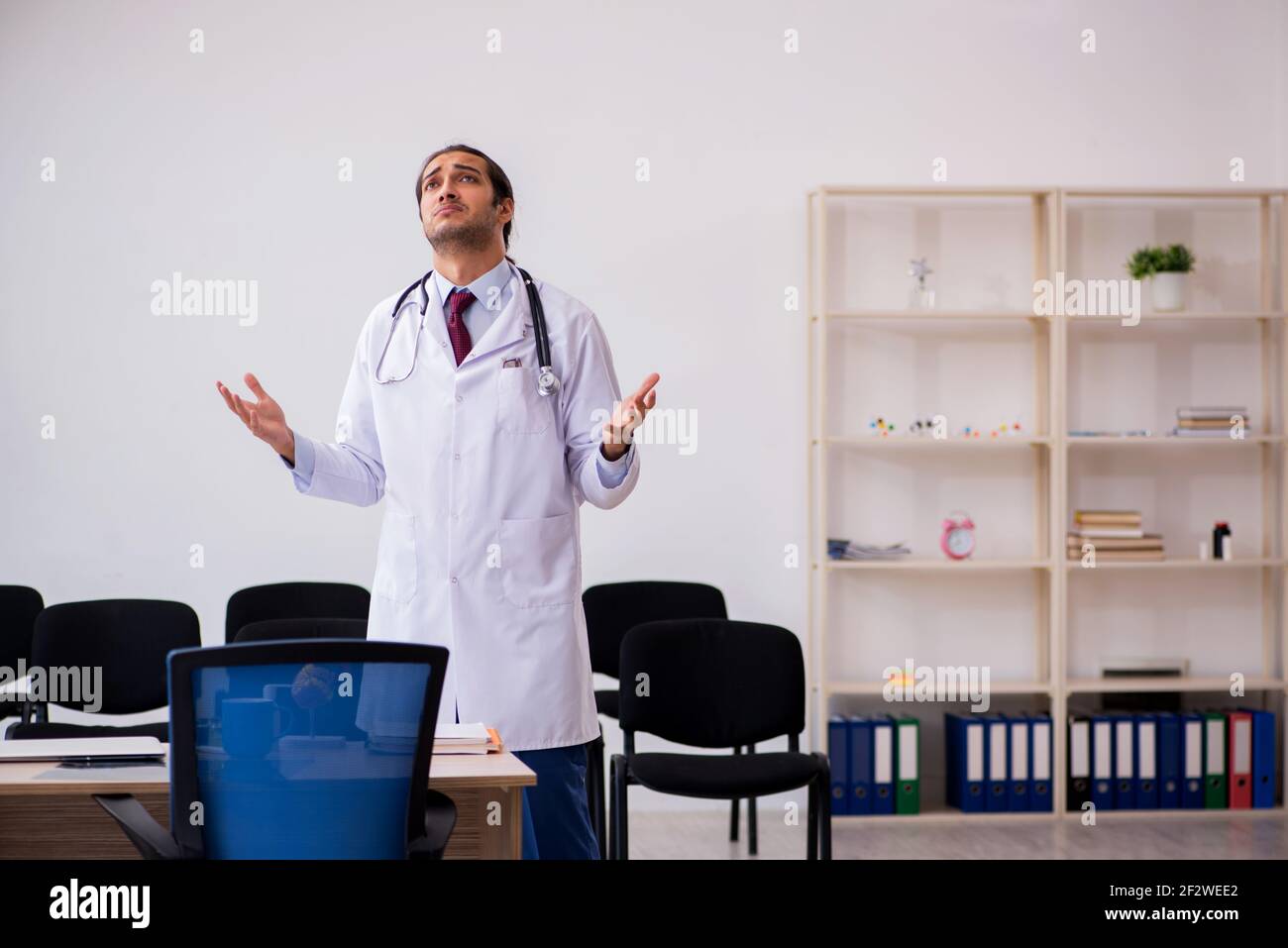 Young doctor giving seminar in the classroom Stock Photo - Alamy