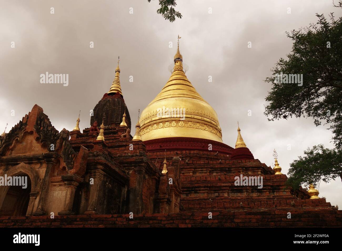 Stunning gold leaf covered pagoda in the old city of Bagan Stock Photo ...