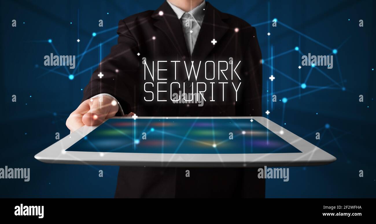 Person holding tablet, security concept Stock Photo - Alamy