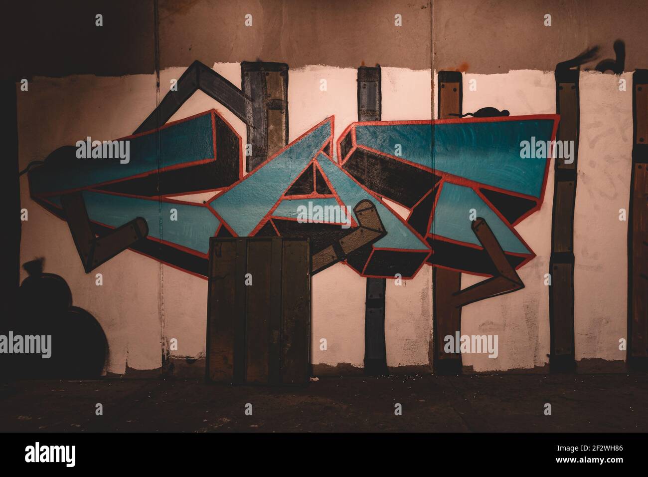 An old abandoned industrial area, with lots of graffiti that is slowly ...