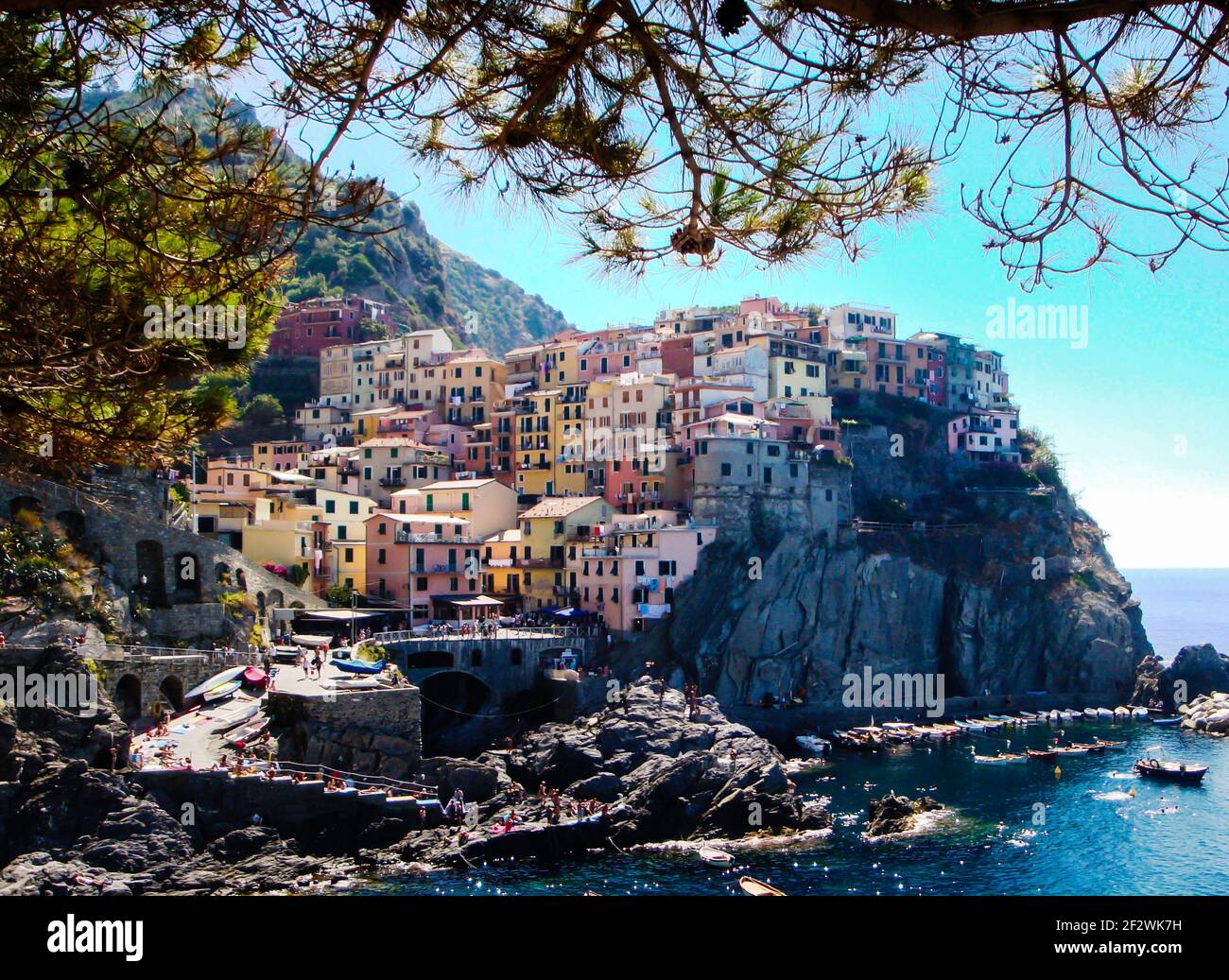 View of the town of Manarola in the Cinque Terre on a beautiful late ...