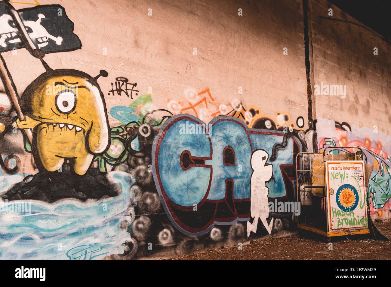 An old abandoned industrial area, with lots of graffiti that is slowly ...