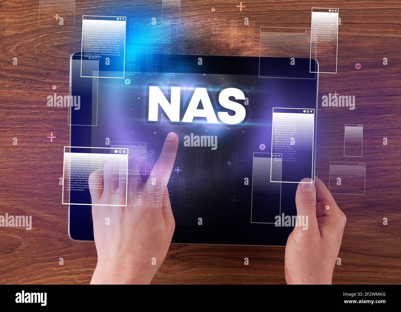 Close-up of a hand holding tablet Stock Photo - Alamy