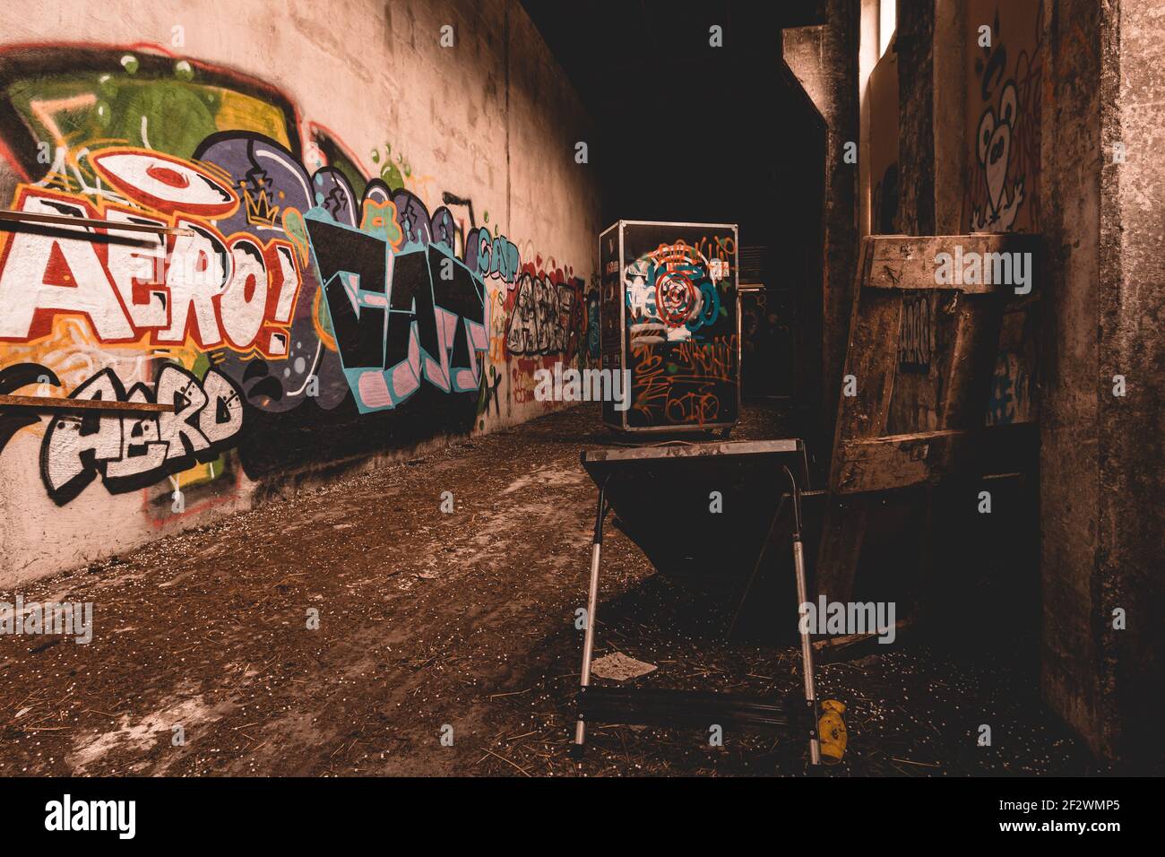 An old abandoned industrial area, with lots of graffiti that is slowly ...