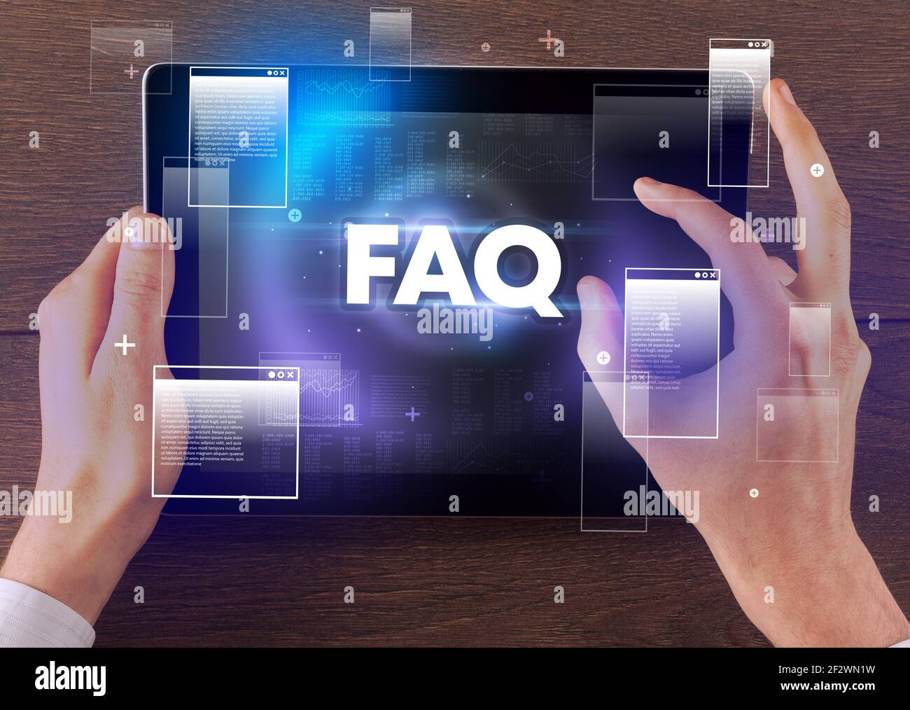 Close-up of a hand holding tablet Stock Photo - Alamy