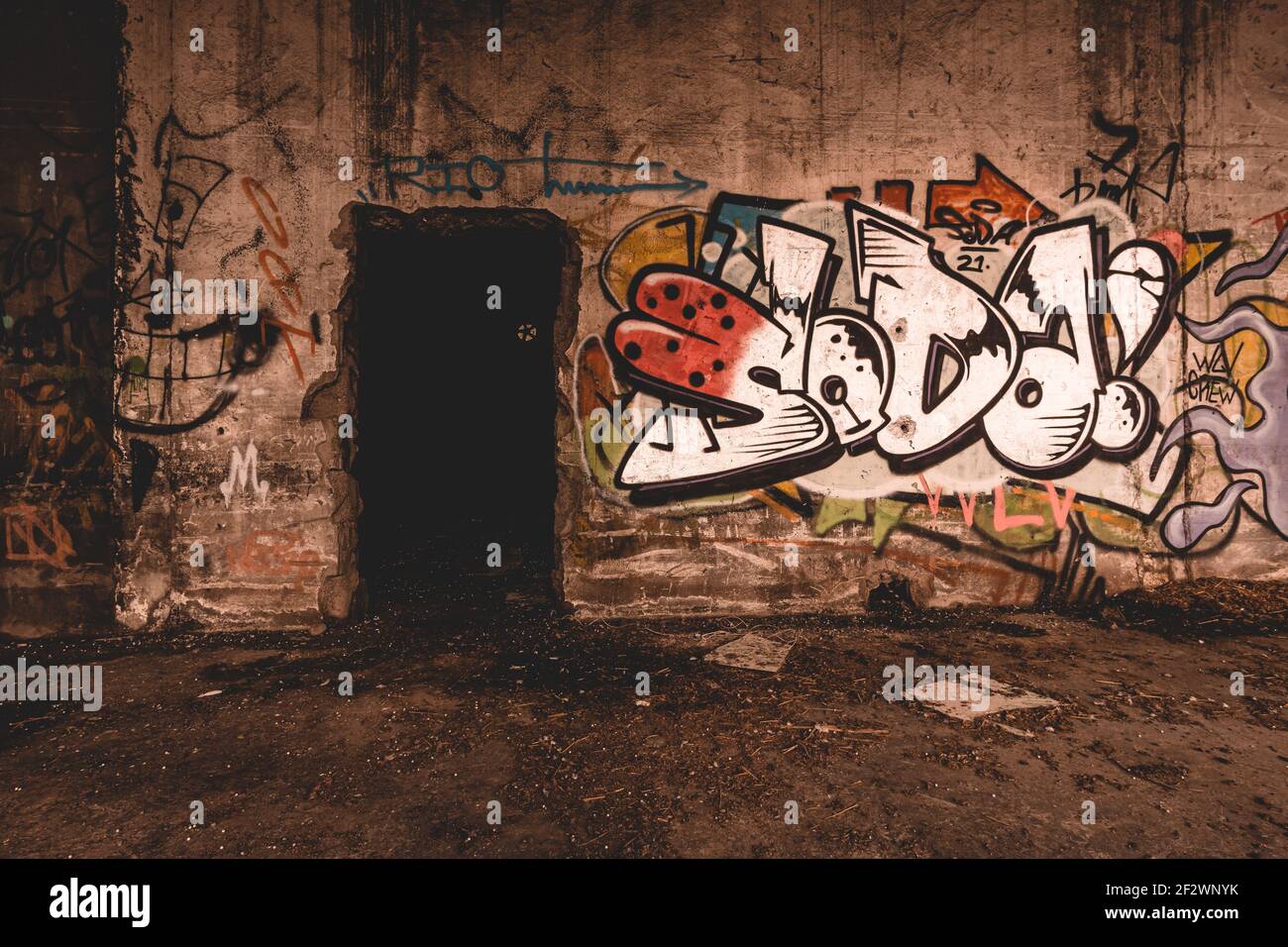 An old abandoned industrial area, with lots of graffiti that is slowly ...