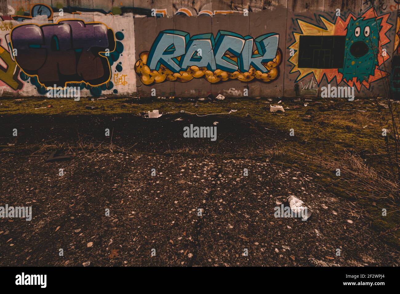 An old abandoned industrial area, with lots of graffiti that is slowly ...