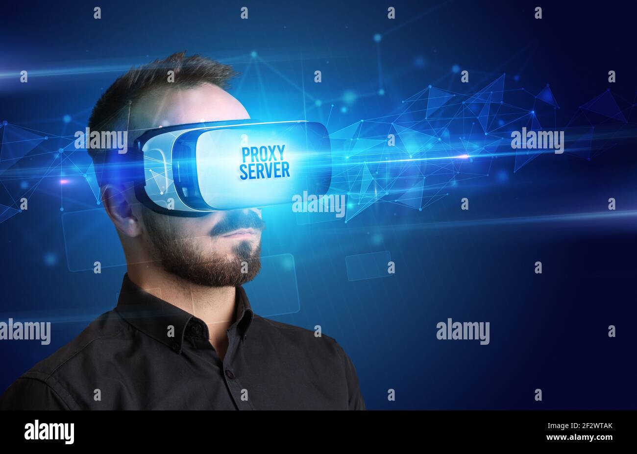 Businessman looking through Virtual Reality glasses, virtual security ...